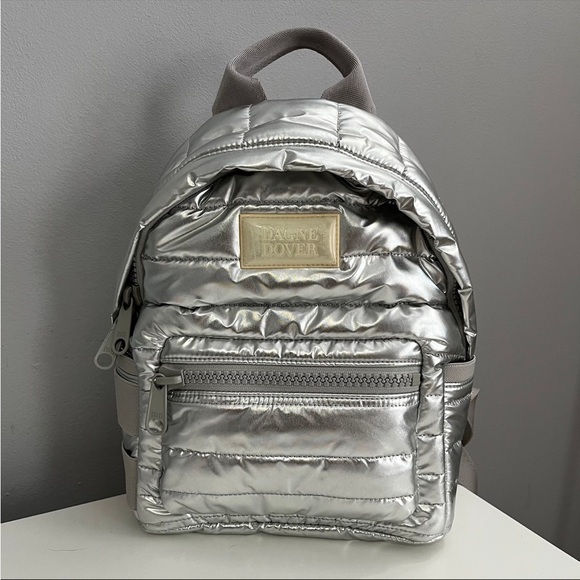 Dagne Dover | Bags | Dagne Dover Small Backpack In Silver Puff | Poshmark